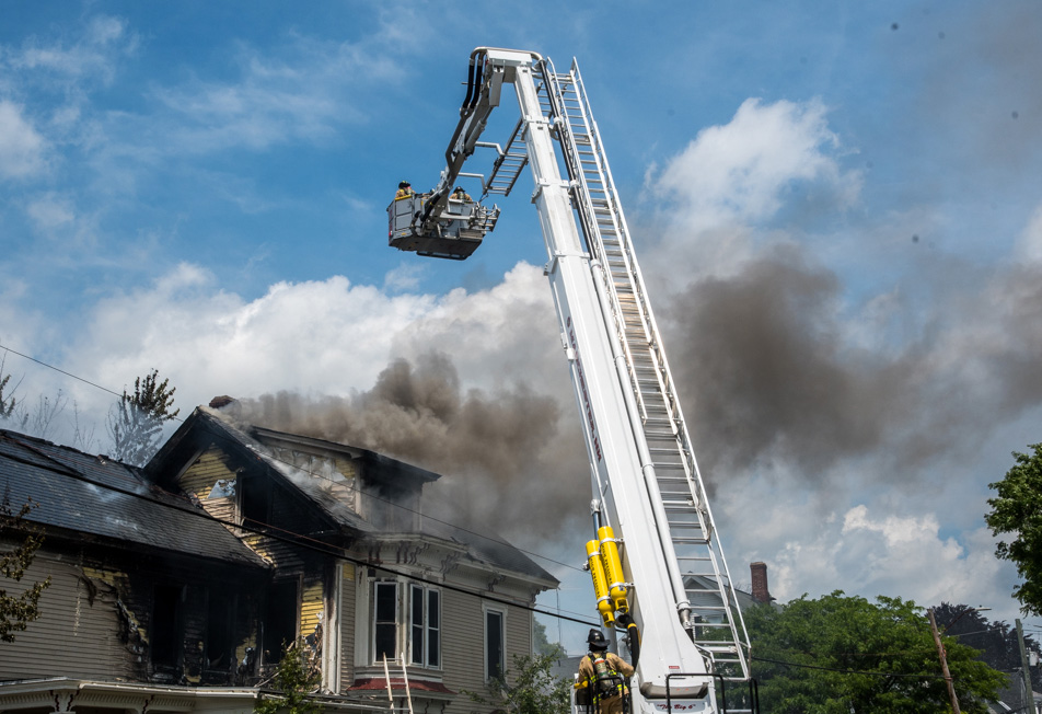 Multiple alarms sounded for Sunday morning tenement fire that spread to ...